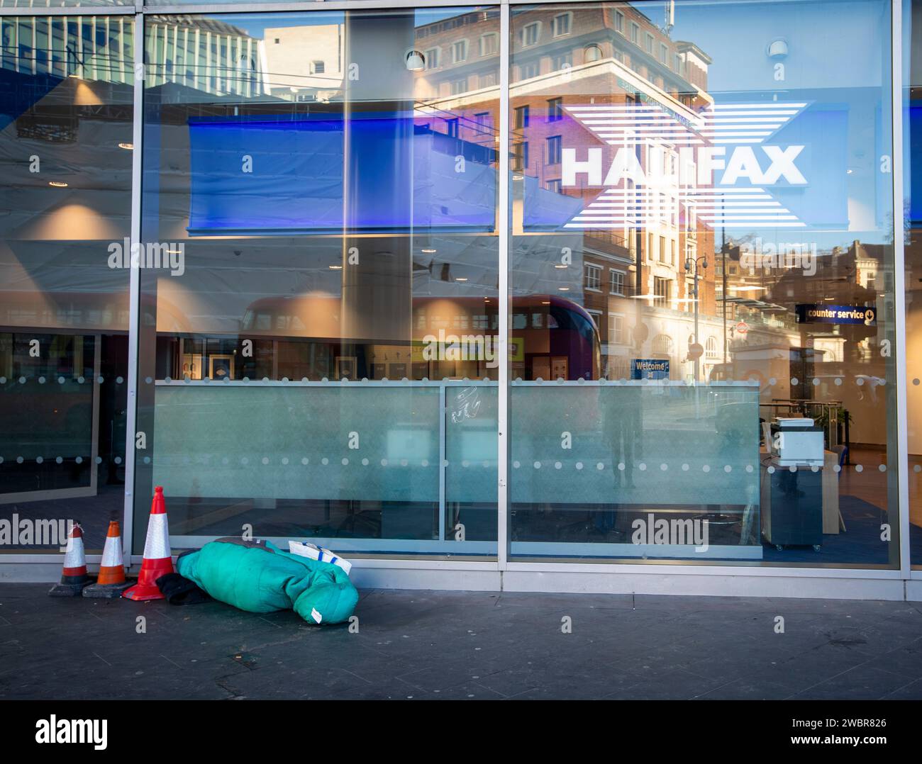 A homeless person sleeping in freezing cold weather outside the Halifax ...