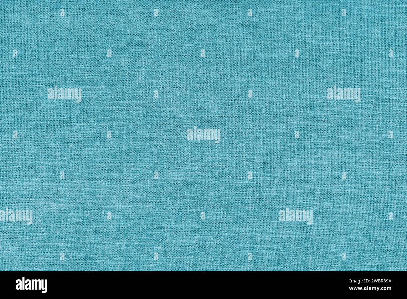 Textile background, cyan coarse fabric texture, cloth structure close ...