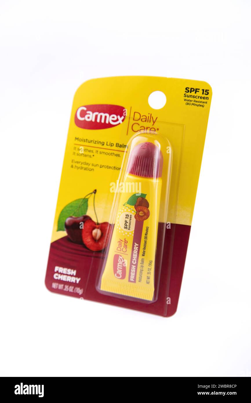 Carmex brand cherry flavored moisturizing lip balm isolated on white ...