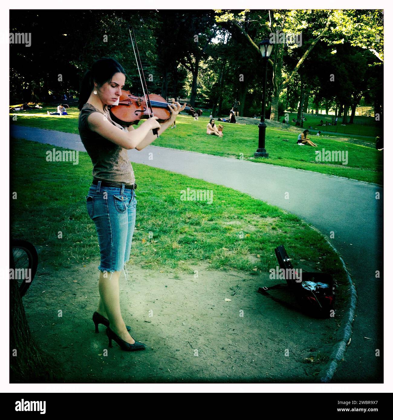 Playing at park Cut Out Stock Images & Pictures - Alamy