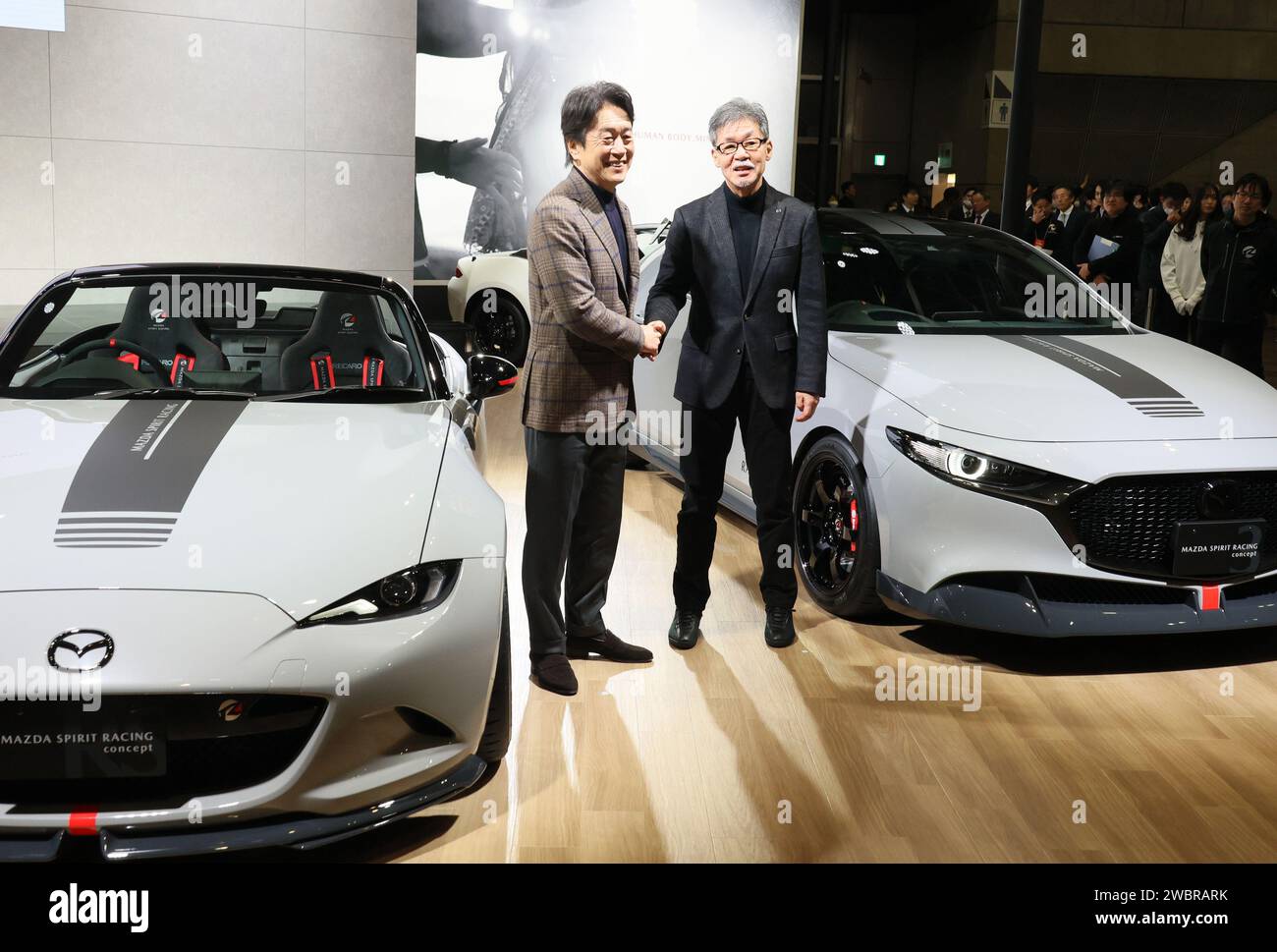 Chiba, Japan. 12th Jan, 2024. Japanese automaker Mazda Motor president Masahiro Moro (L) and ...