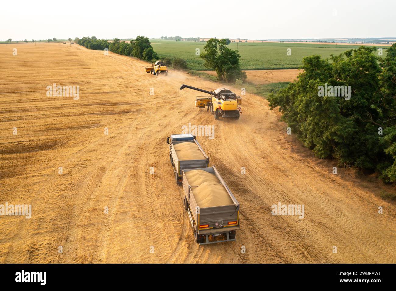 BERLIN , GERMANY - JULY 15 2023: Combine harvester with unloading pipe ...