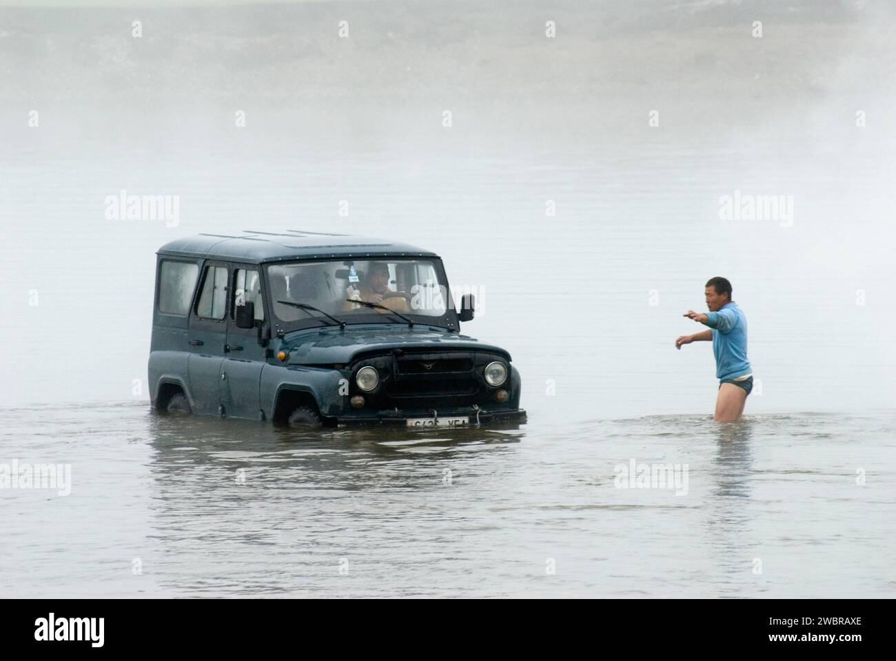 Vehicle stuck in river, Mongolia Stock Photo - Alamy