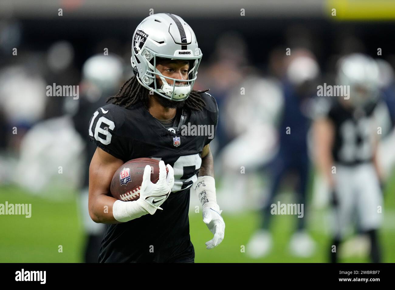 Las Vegas Raiders wide receiver Jakobi Meyers (16) warms up before an NFL football game against ...
