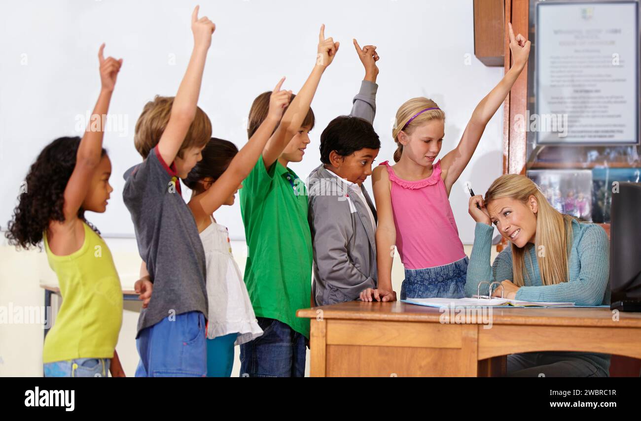 Teacher woman, class and children with raised hand for questions ...