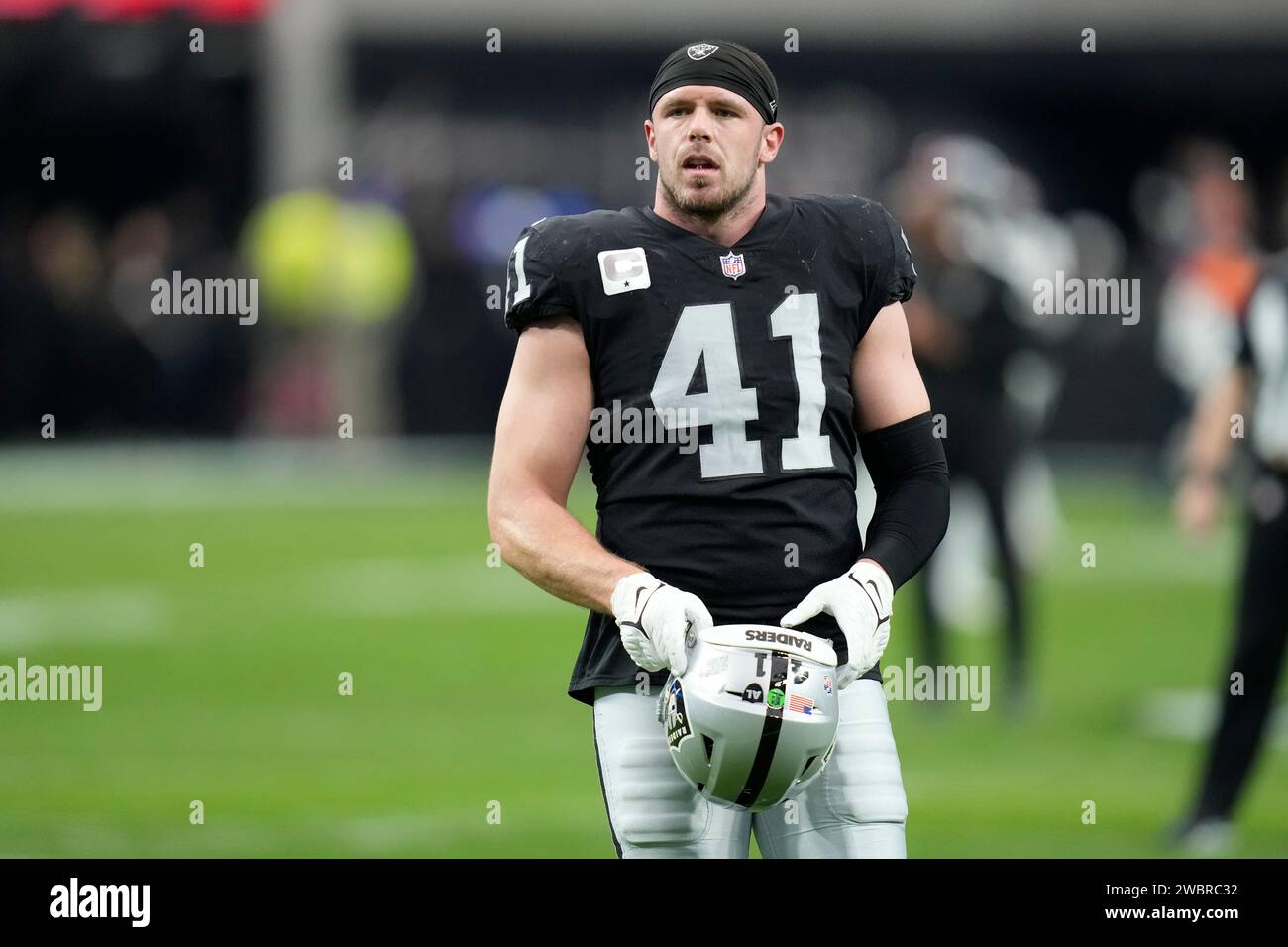 Las Vegas Raiders linebacker Robert Spillane (41) warms up before an NFL football game against ...