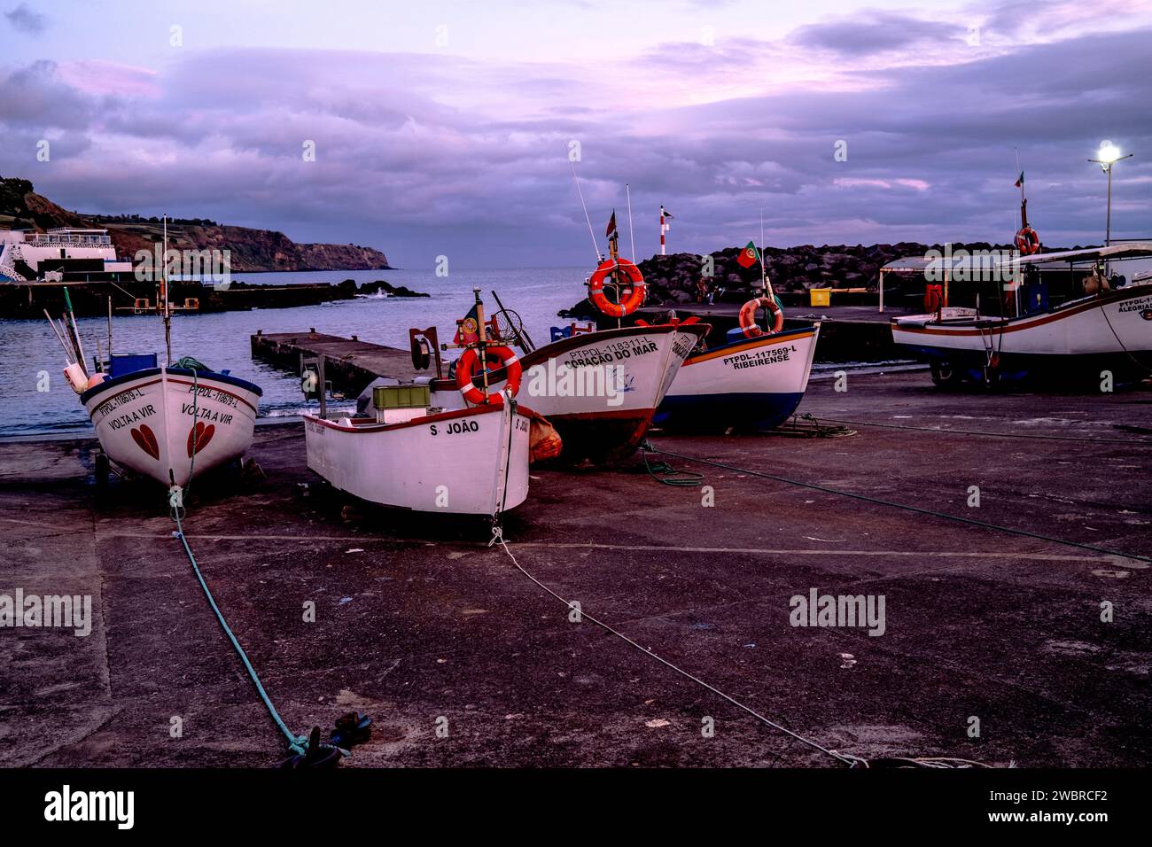 Fishing boats at dawn on the Azores Stock Photo - Alamy