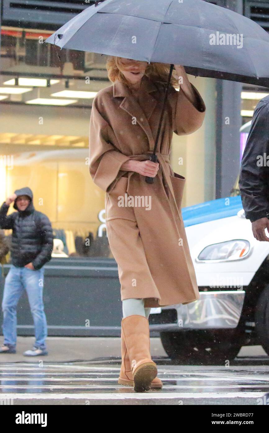 Nicole Kidman in the rain on the set of new thriller 'Babygirl' in New York City Featuring ...