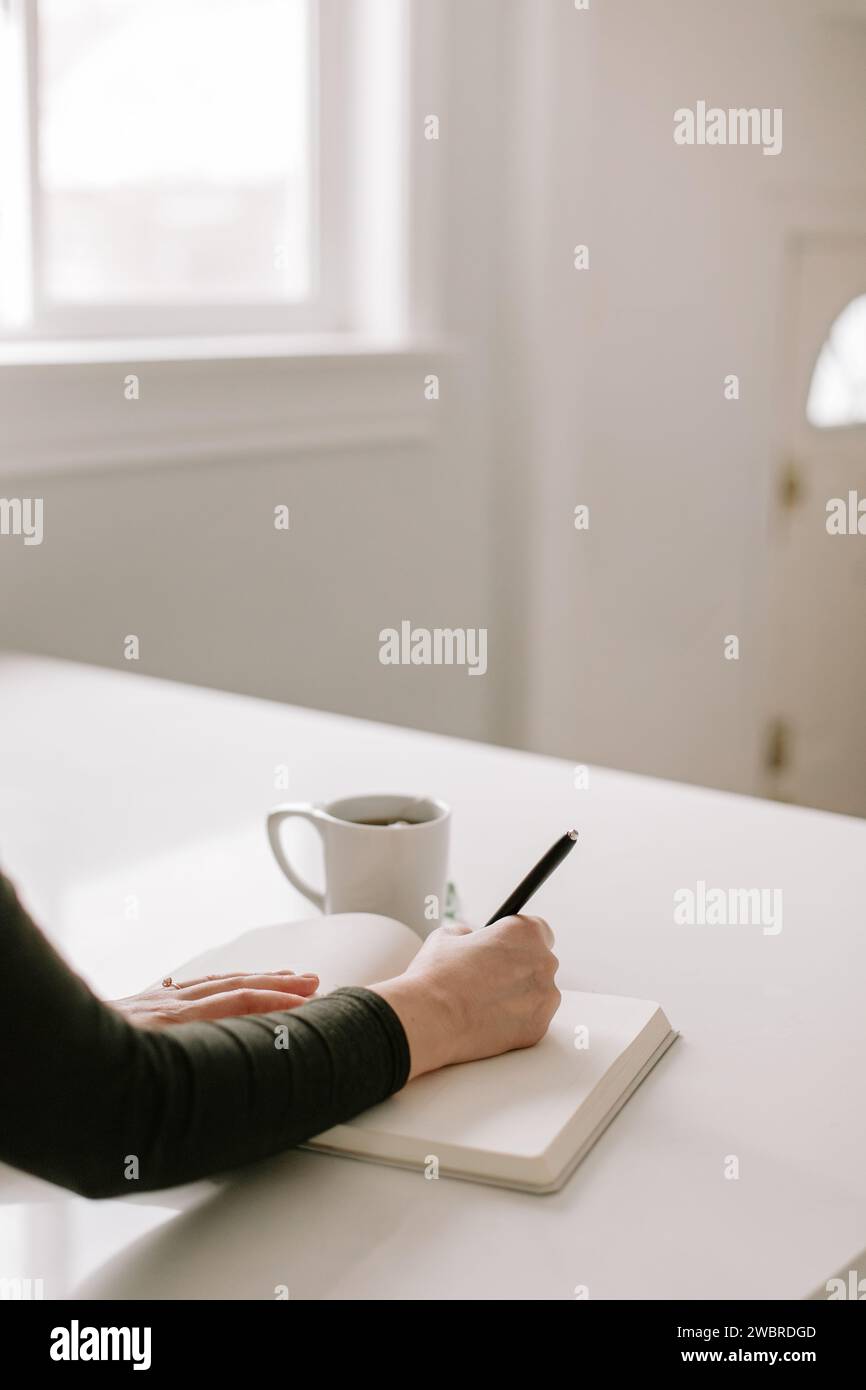 Woman handwriting in living hi-res stock photography and images - Alamy