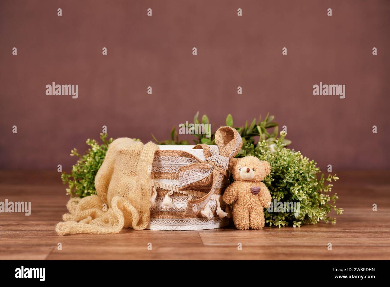 Backdrop with empty box with boho style lace, teddy bear and brown ...