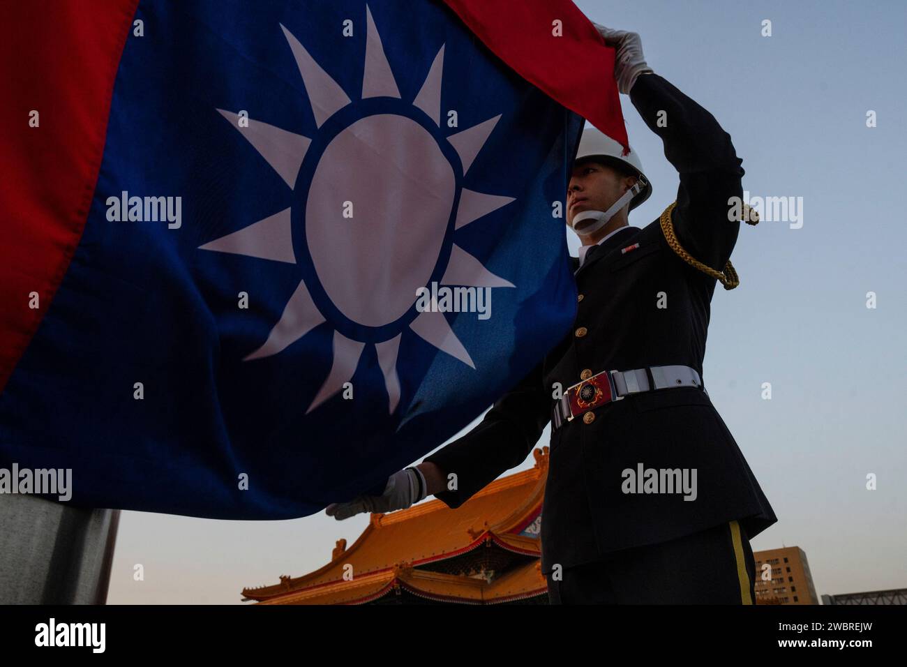 A honor guard takes part in a flag lowering ceremony at Chiang Kai Shek ...