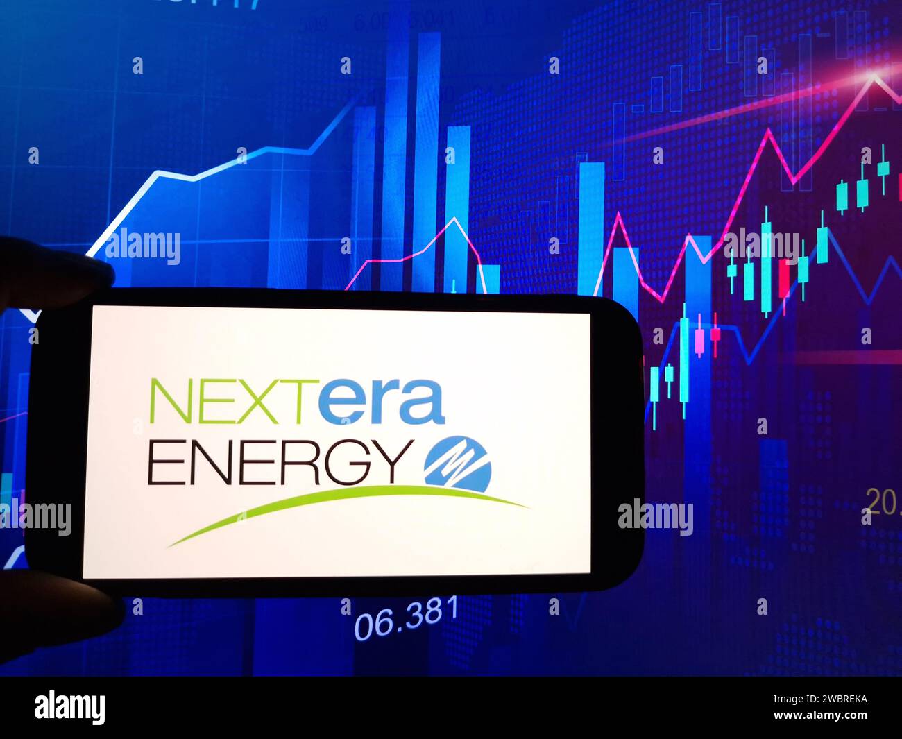 Konskie, Poland - January 04, 2024: NextEra Energy company logo displayed on mobile phone screen ...
