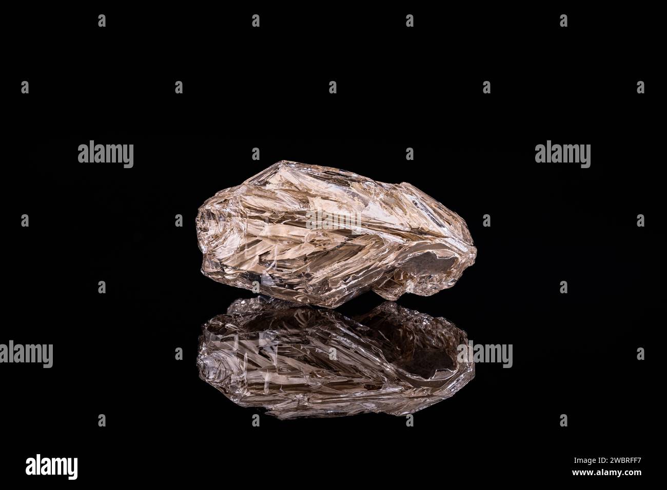 clay inclusion inside quartz isolated photography on black background ...