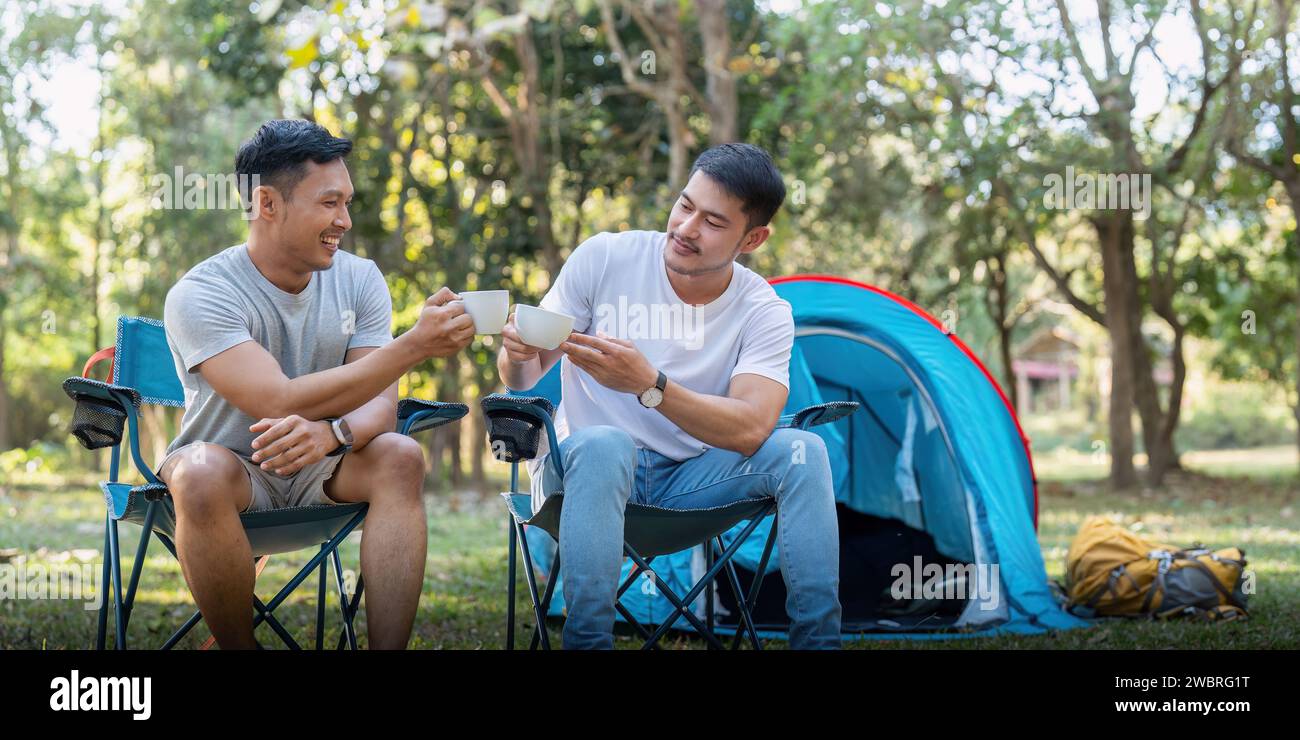 Male gay couple asian traveling with tent camping outdoor and various ...