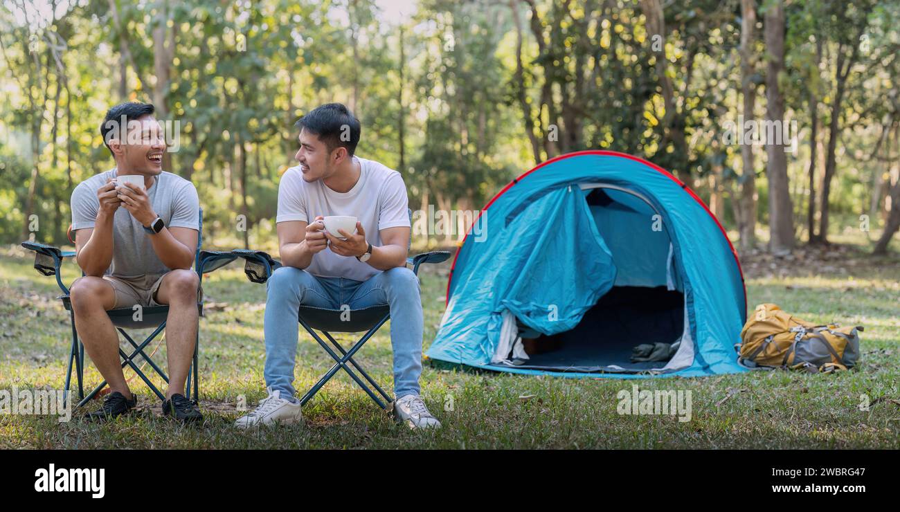 Male gay couple asian traveling with tent camping outdoor and various ...