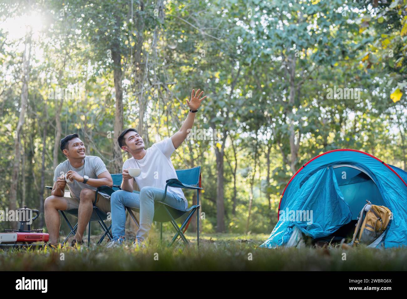 Male gay couple asian traveling with tent camping outdoor and various ...