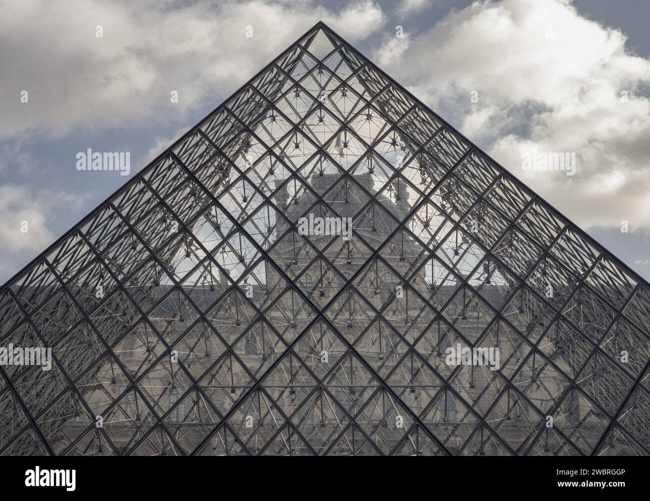 France, Paris - Jan 03, 2024 - Geometrical forms of Glass pyramid with ...