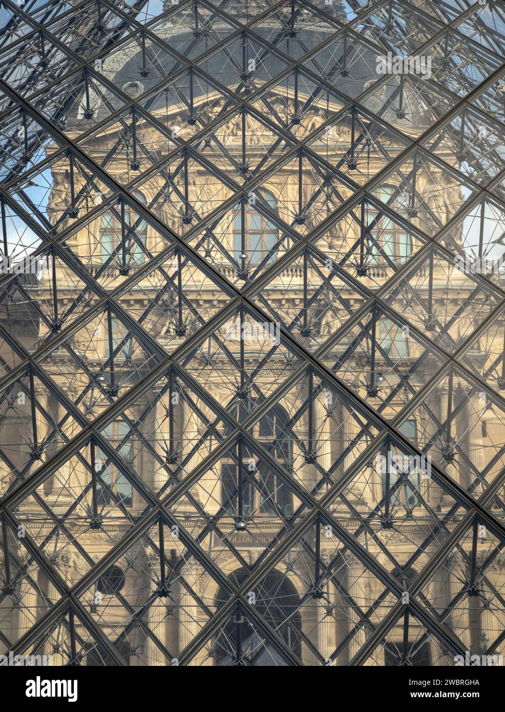 France, Paris - Jan 03, 2024 - Detail of Glass pyramid in fron of The ...