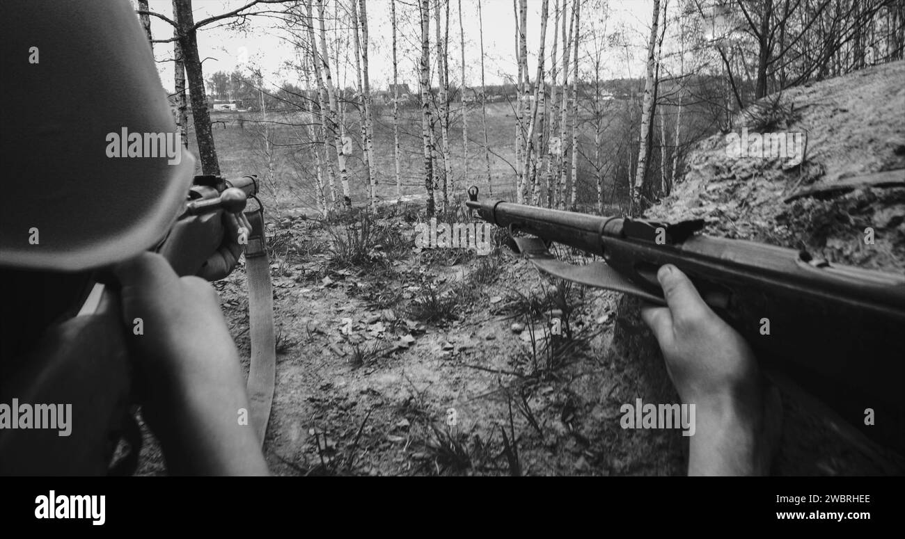 Re-enactors Dressed As Soviet Russian Soldier Aiming With Rifles ...