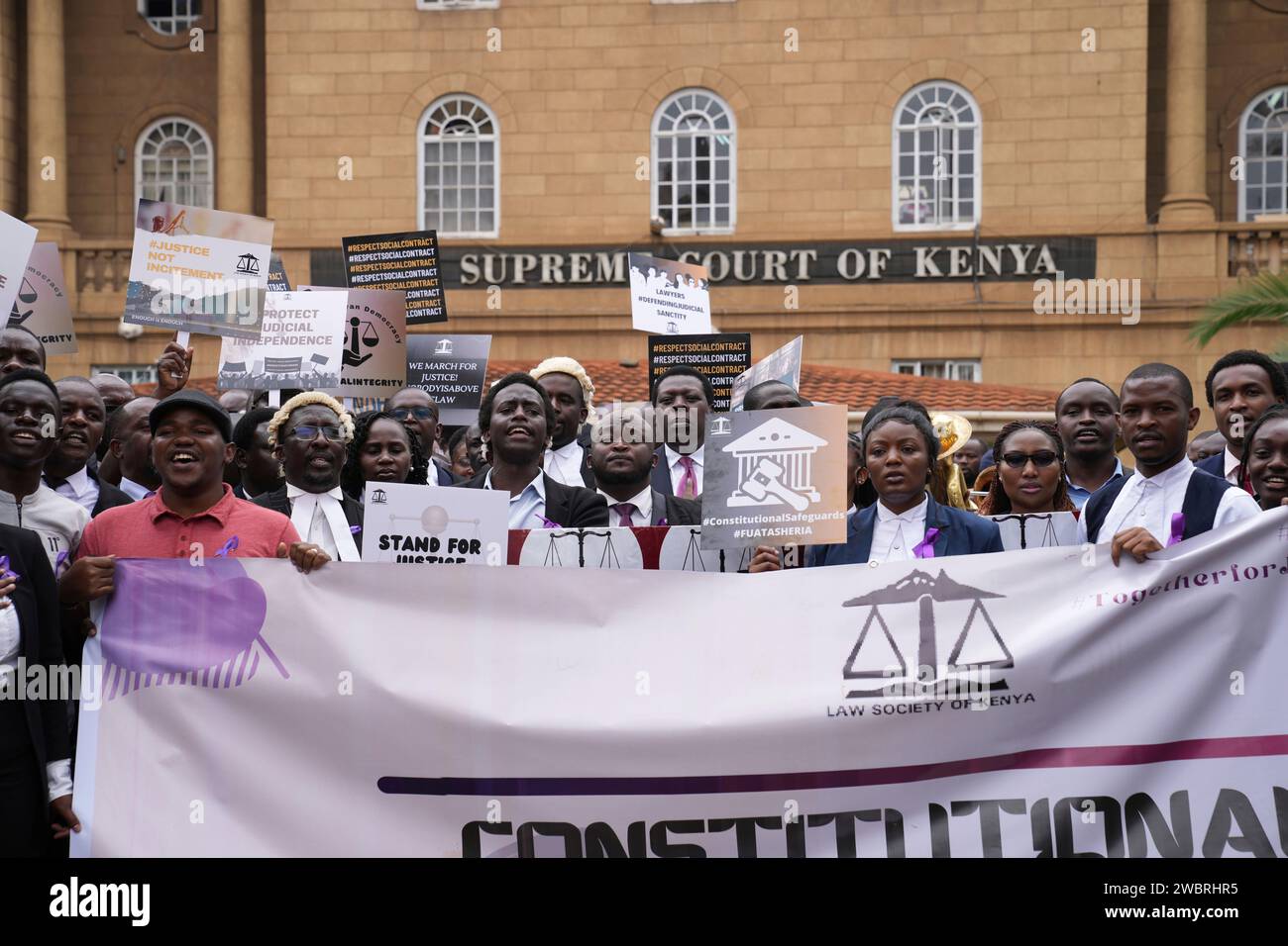 Human rights activists and members of the Law Society of Kenya hold a ...