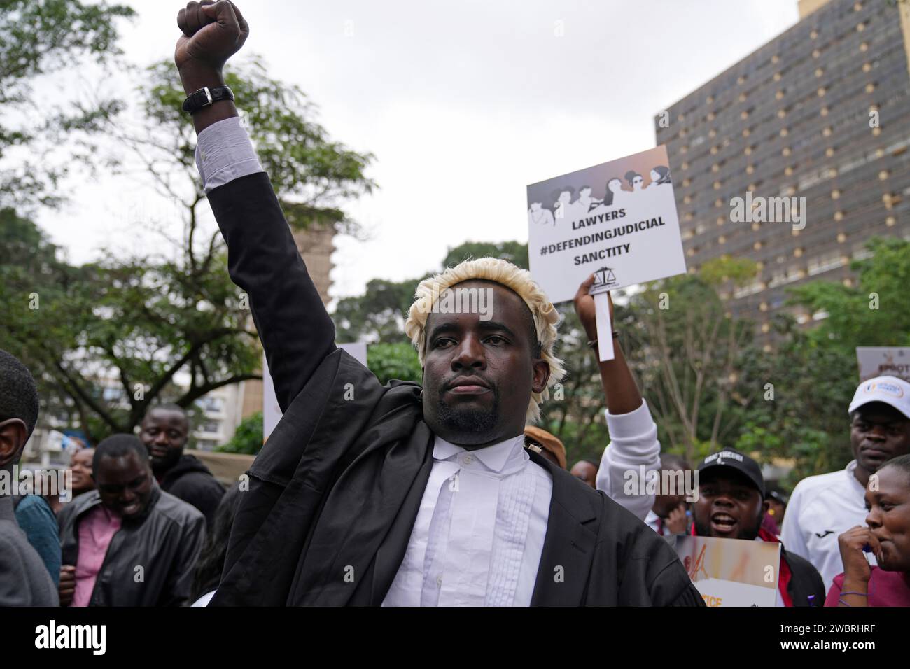 Human rights activists and members of the Law Society of Kenya hold a ...