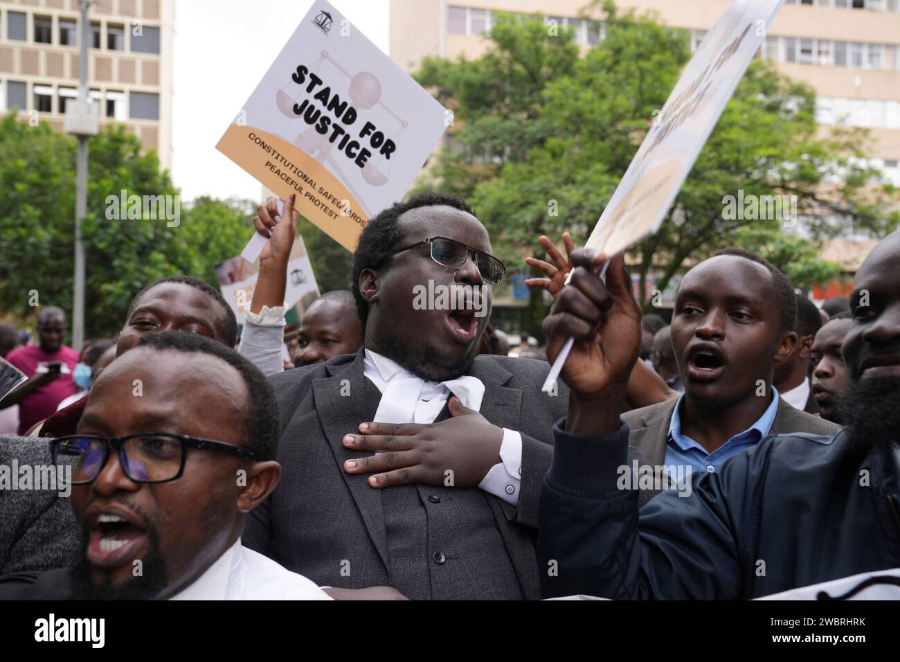 Human rights activists and members of the Law Society of Kenya hold a ...