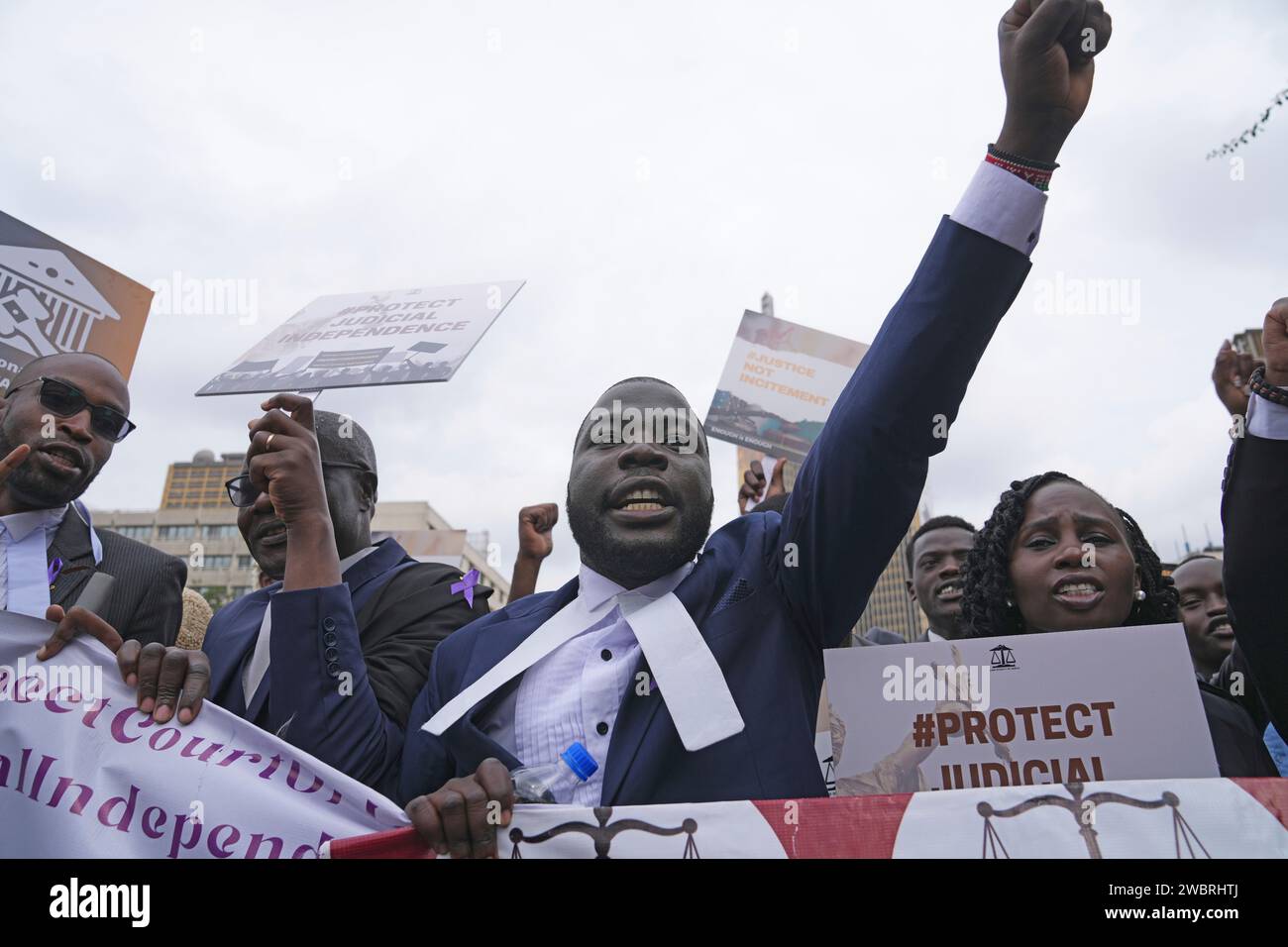 Human rights activists and members of the Law Society of Kenya hold a ...