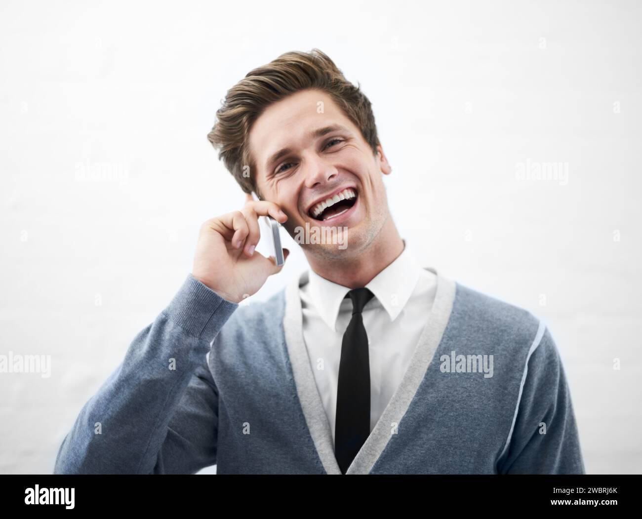 Happy man, phone call and laughing for funny joke, conversation or meme ...
