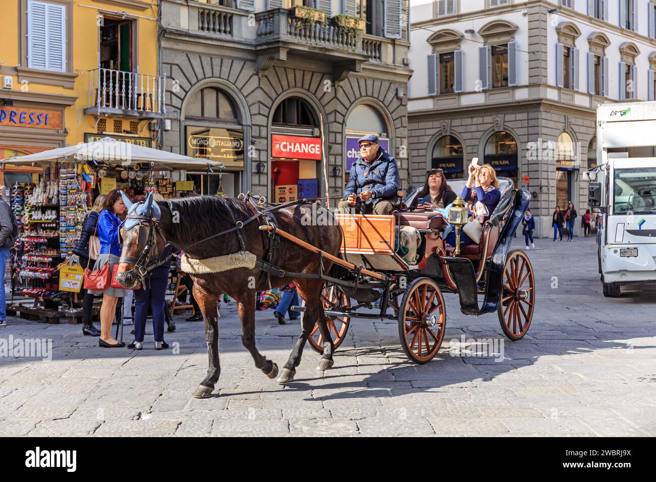 Florence, Italy - April 08, 2018: Tour horse pulls a tourist transport ...