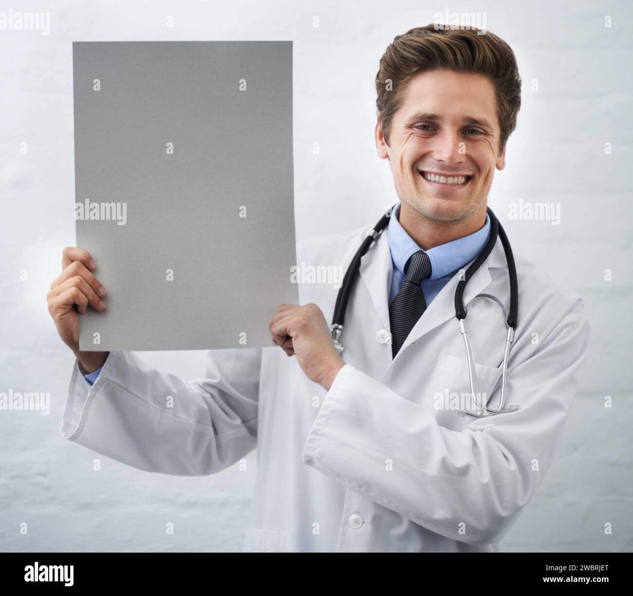 Happy man, portrait and doctor with poster in healthcare, advertising ...
