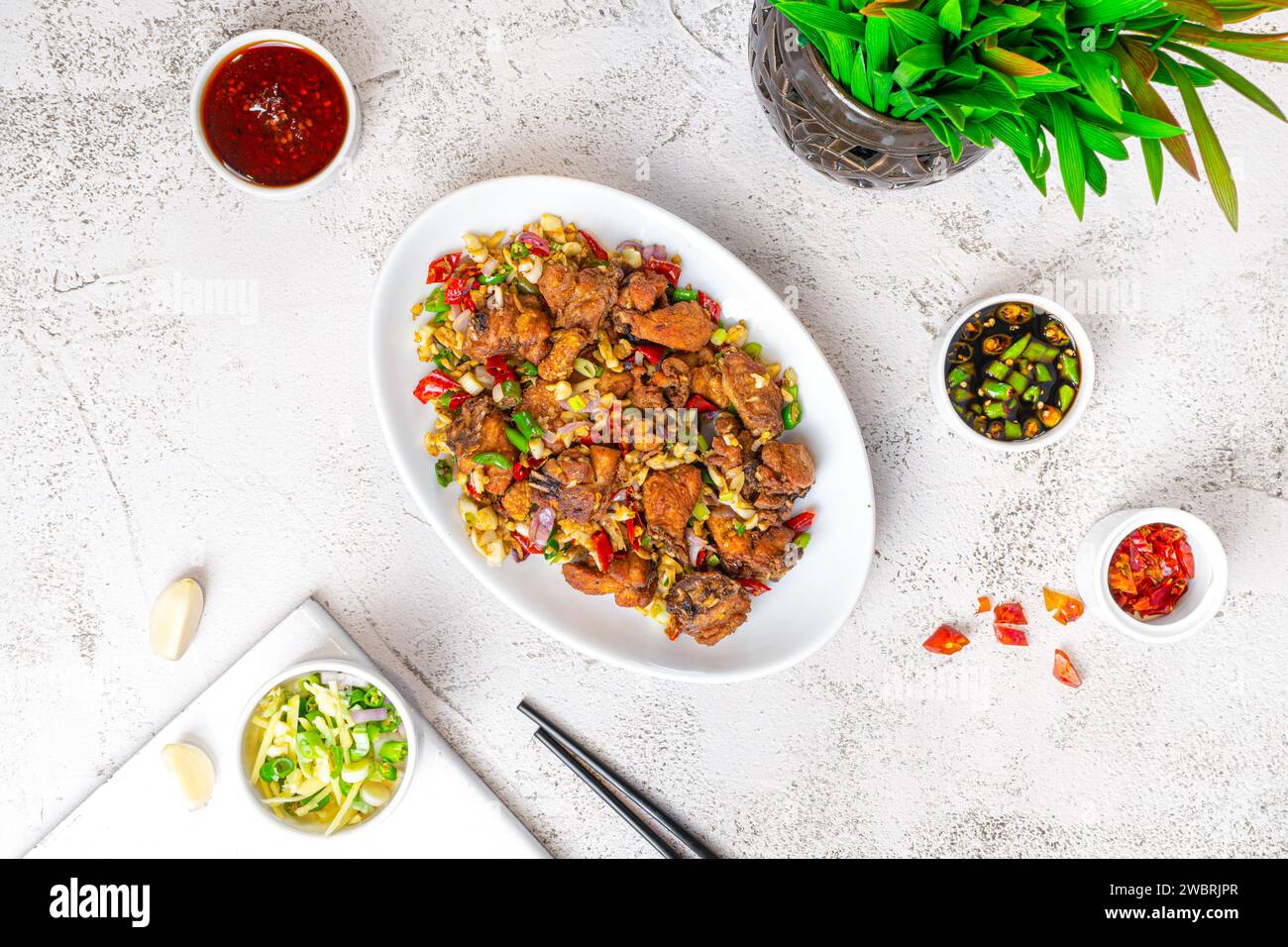 Fried Spicy Chicken with Chili Flake Scallions Stock Photo - Alamy