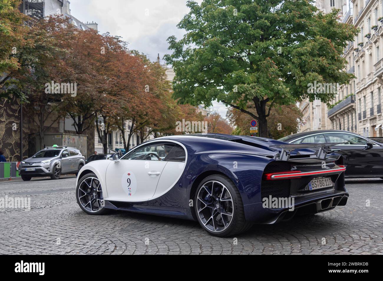 Paris, France - Blue Carbon and Glacier Bugatti Chiron Sport driving on ...