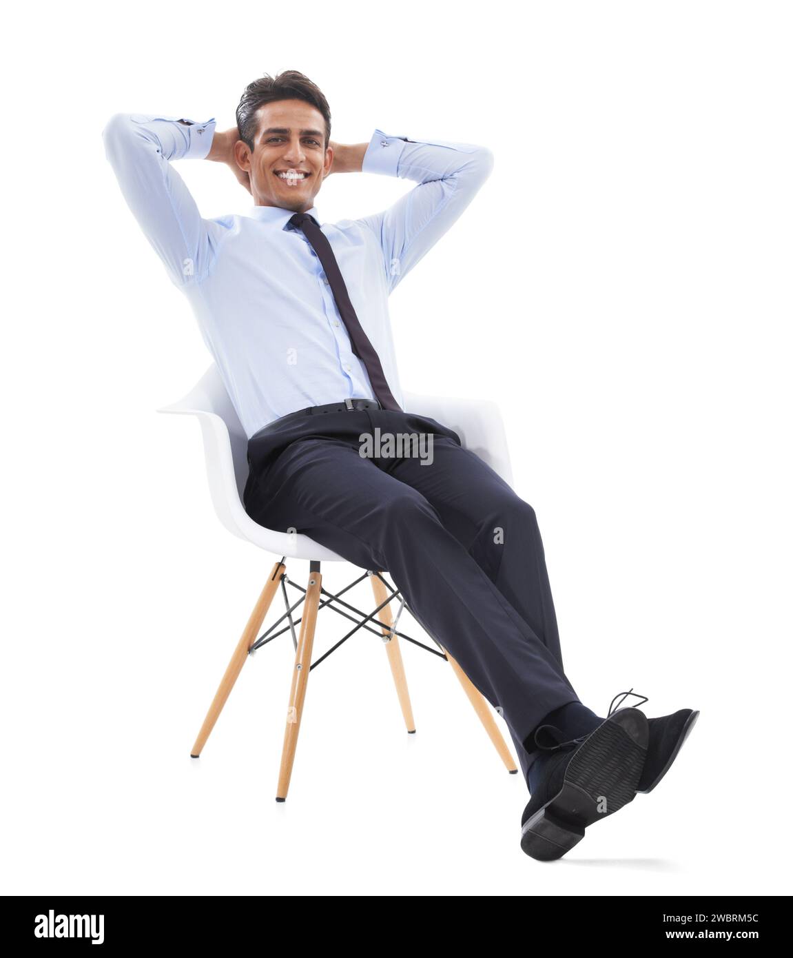 Business man, chair and relaxing in portrait, studio and smiling for ...