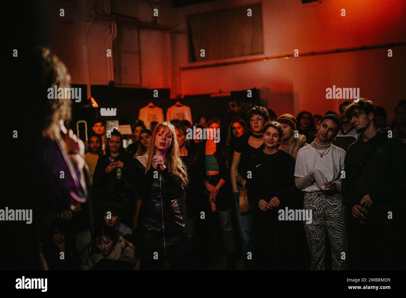 Crowd watching performance Stock Photo - Alamy