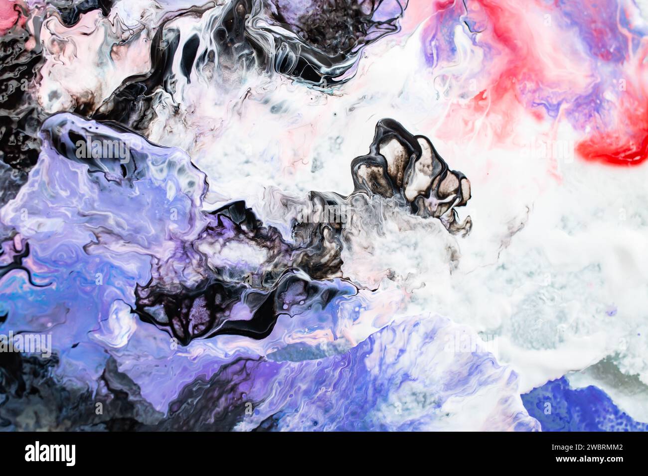 Abstract paint mixture with random pattern, red, blue, purple, black ...