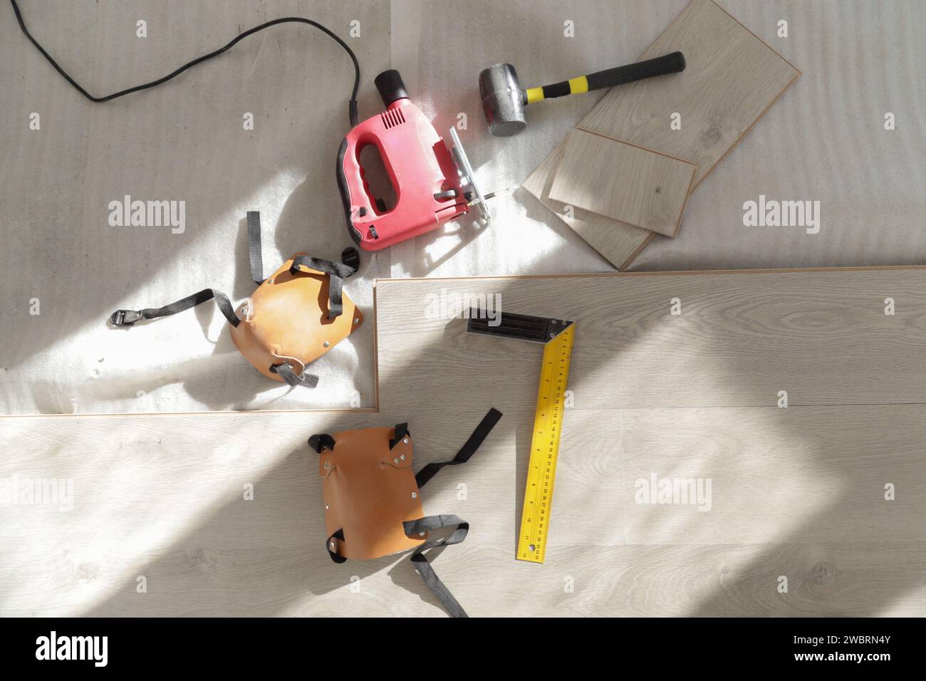 Rubber hammer, ruler with angle bar, tape meter, jig saw and other ...