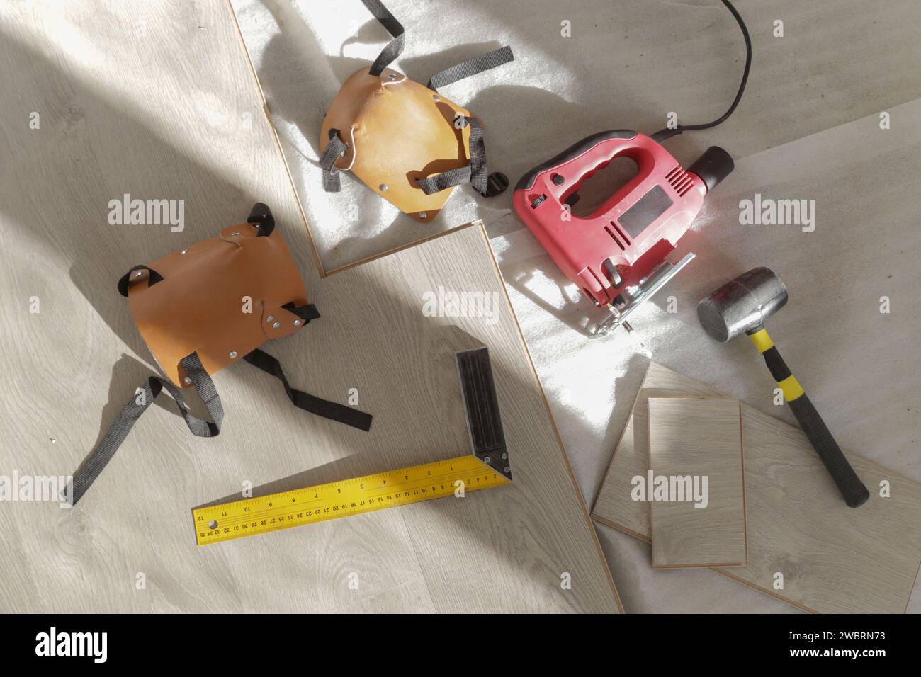 Rubber hammer, ruler with angle bar, tape meter, jig saw and other ...