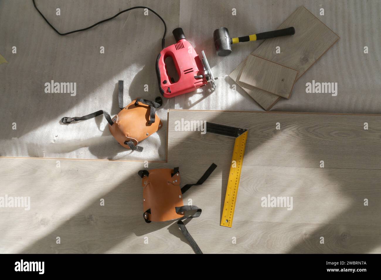 Rubber hammer, ruler with angle bar, tape meter, jig saw and other ...