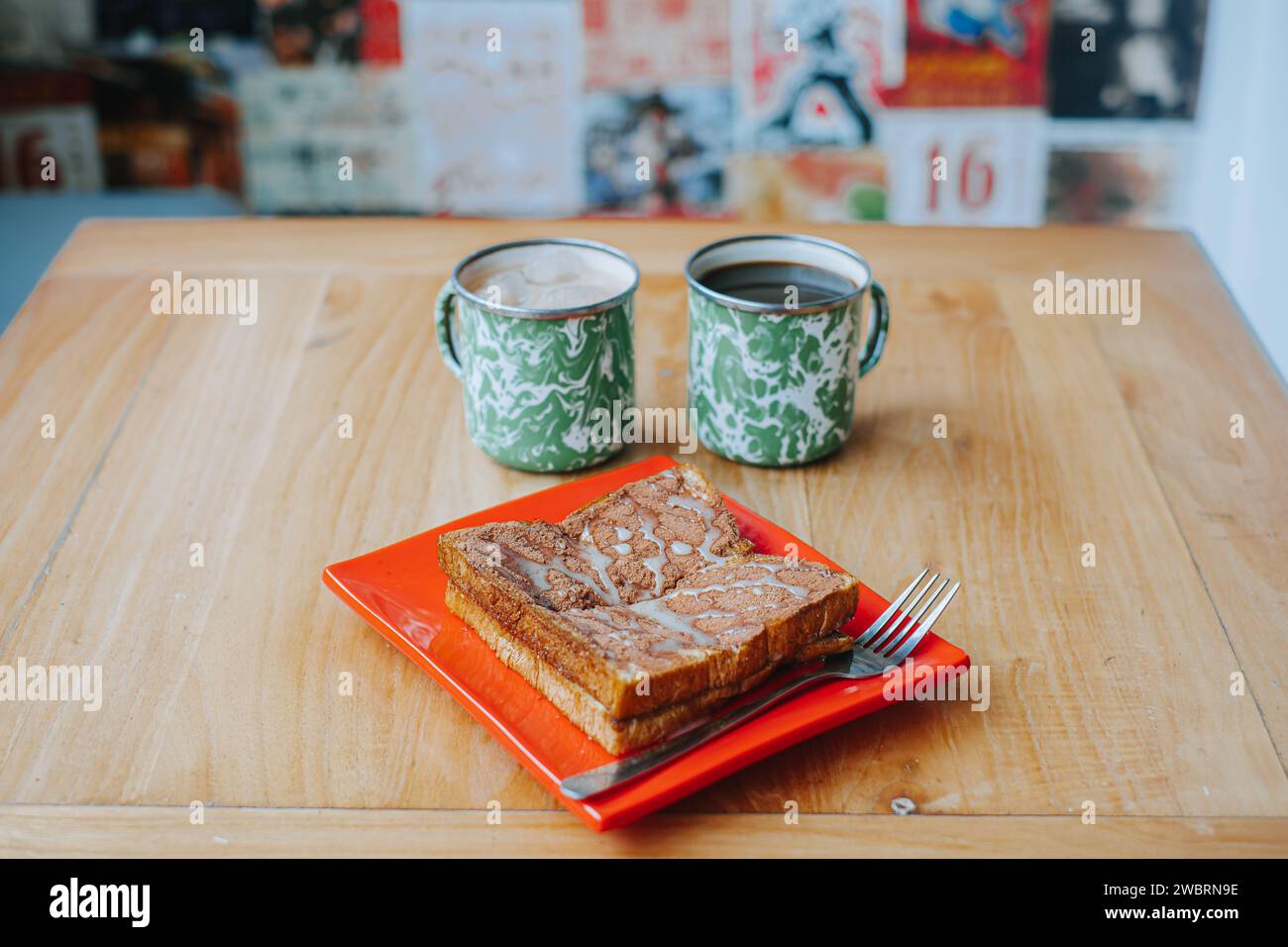 Kopitiam breakfast menu set contains a toast and two cup of coffee with ...