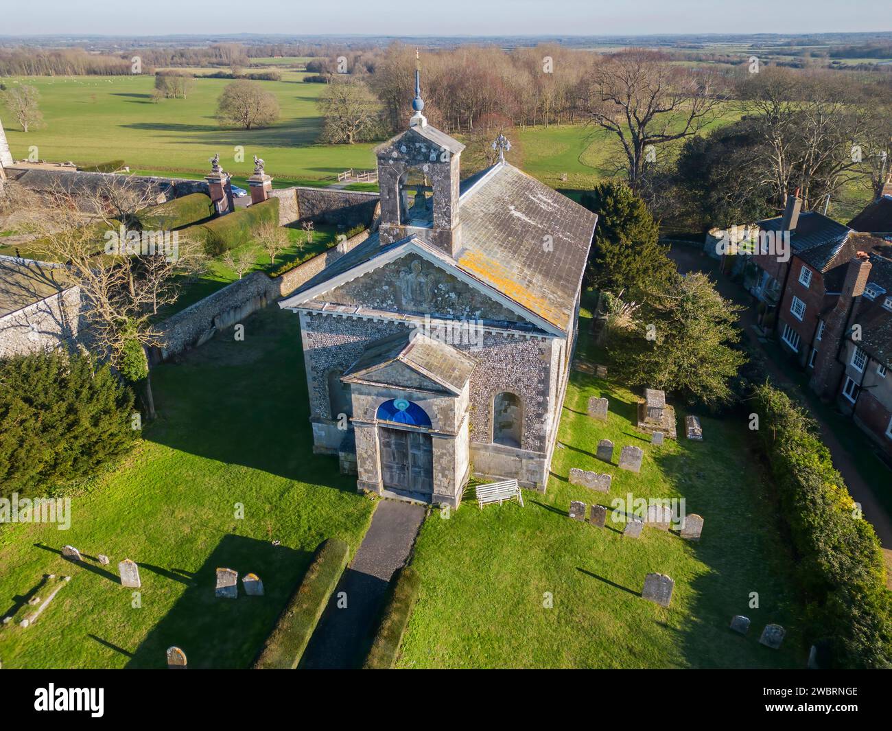 aerial view of st marys the virgin church in glynde on the south downs ...