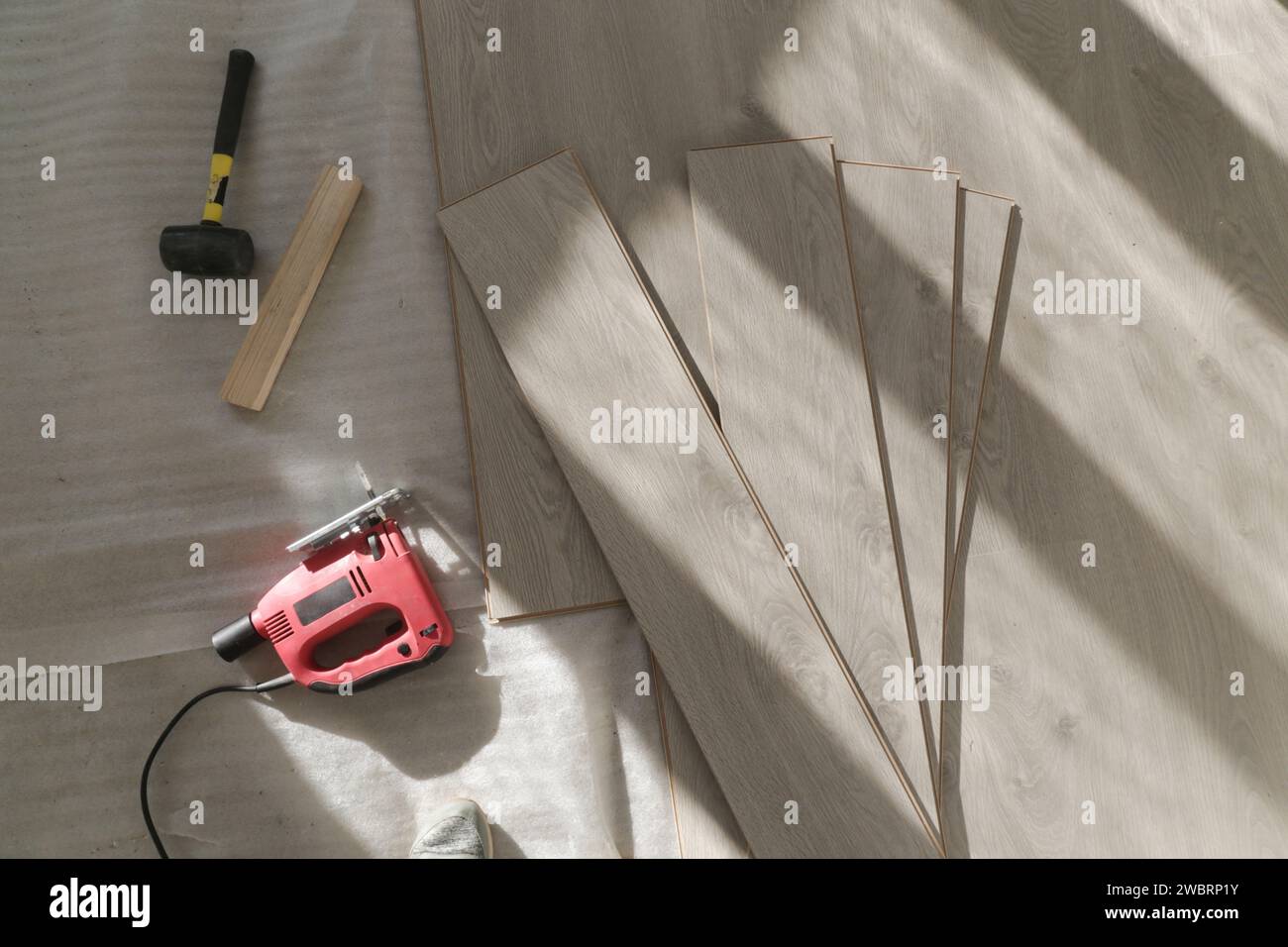 Rubber hammer, ruler with angle bar, tape meter, jig saw and other ...