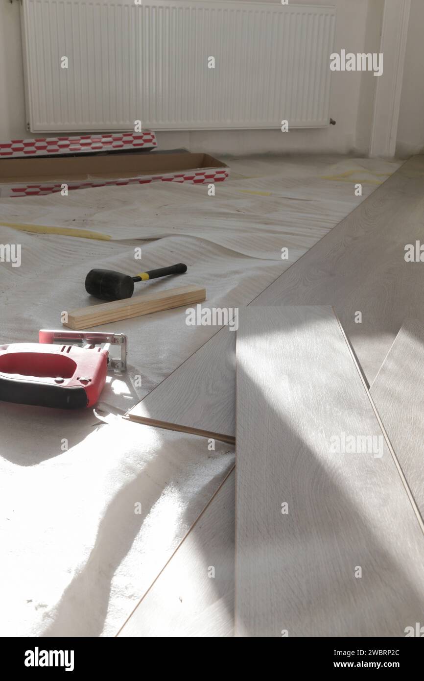 Rubber hammer, ruler with angle bar, tape meter, jig saw and other ...