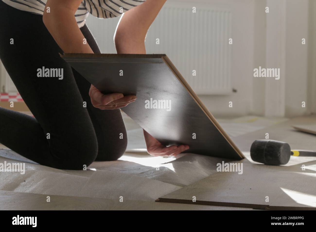 Step by step of laminate flooring installation Stock Photo - Alamy