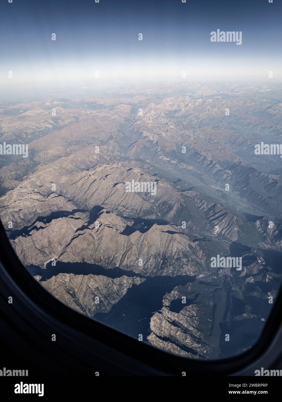 Aerial view of the French Alps in Europe during summer from a passenger ...