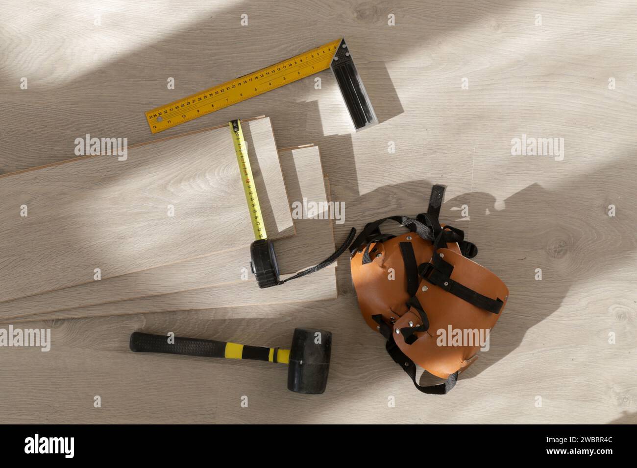 Rubber hammer, ruler with angle bar, tape meter, jig saw and other ...