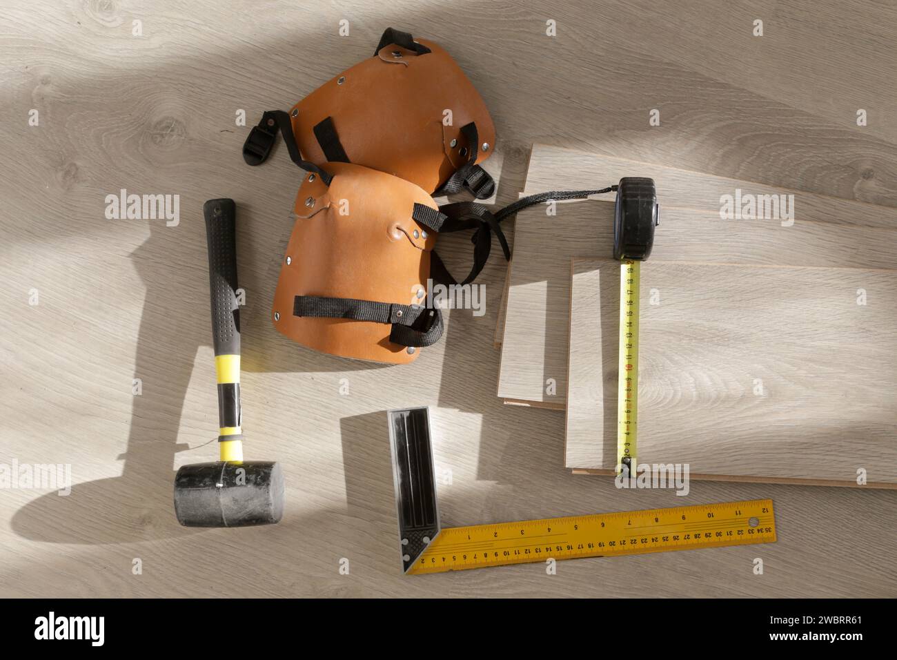 Rubber hammer, ruler with angle bar, tape meter, jig saw and other ...