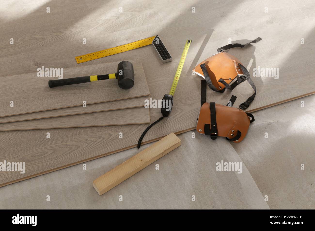 Rubber hammer, ruler with angle bar, tape meter, jig saw and other ...