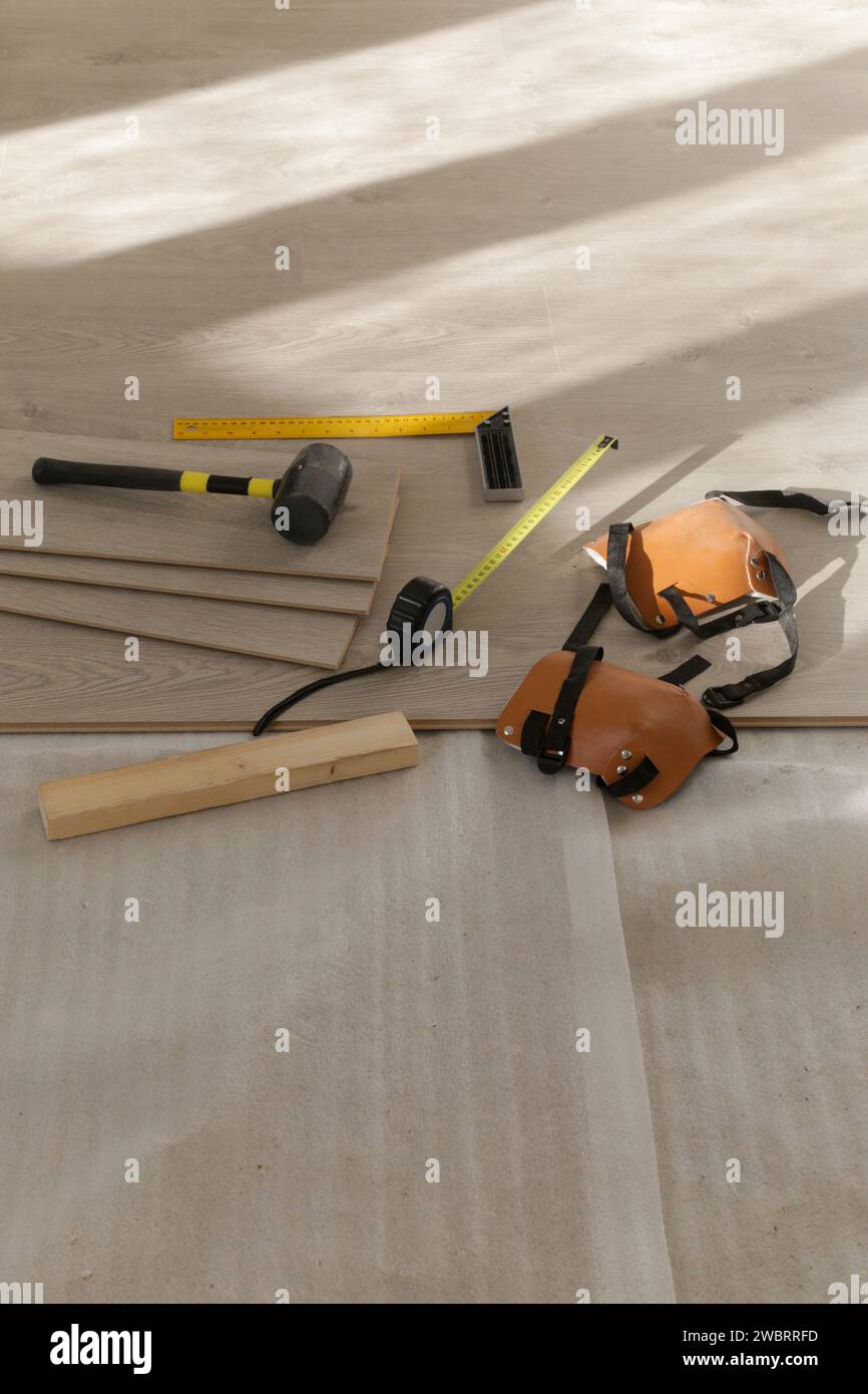 Rubber hammer, ruler with angle bar, tape meter, jig saw and other ...