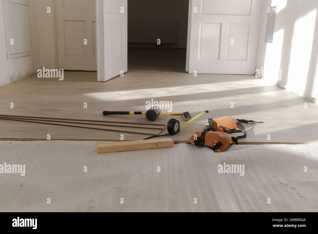 Rubber hammer, ruler with angle bar, tape meter, jig saw and other ...