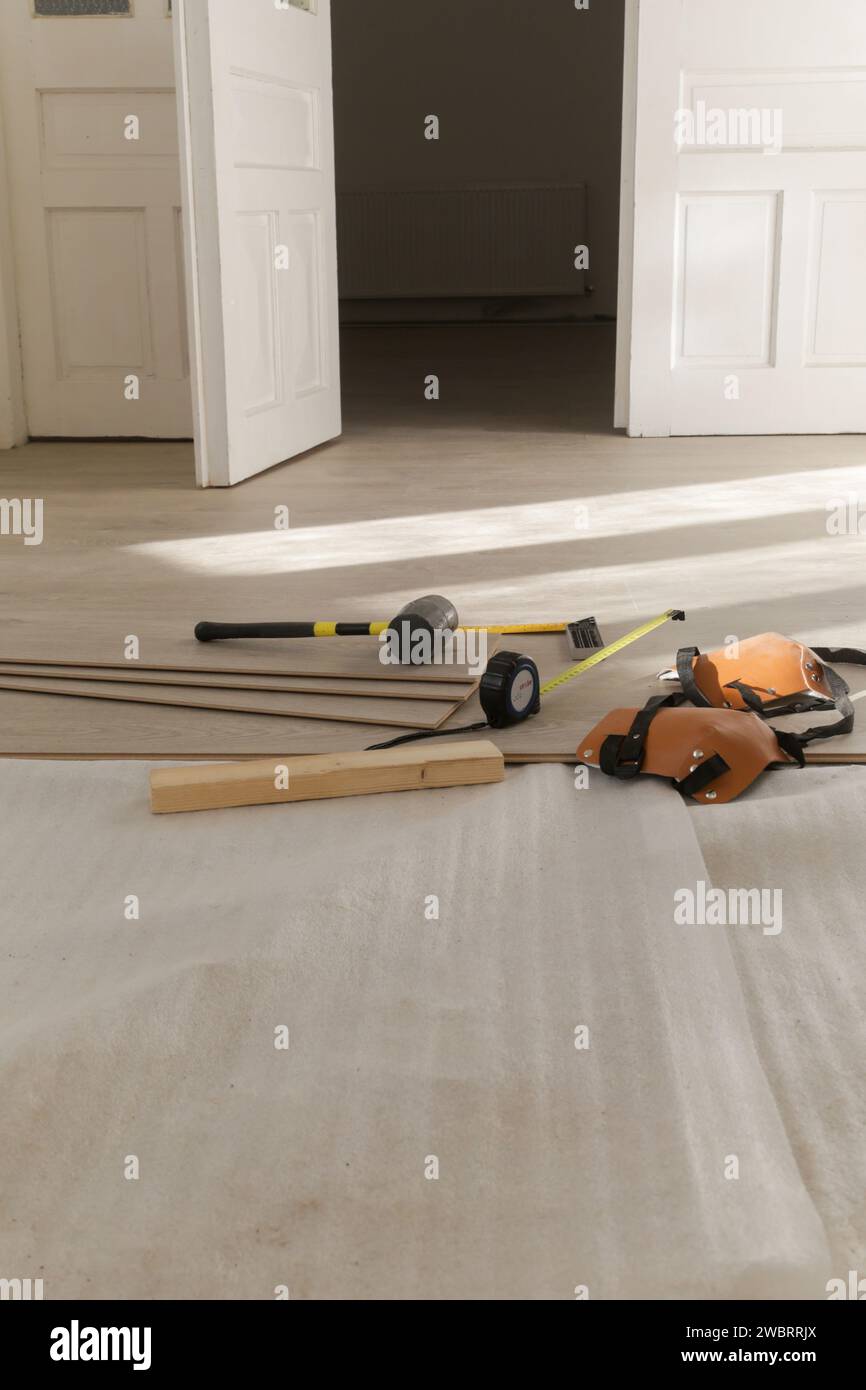 Rubber hammer, ruler with angle bar, tape meter, jig saw and other ...